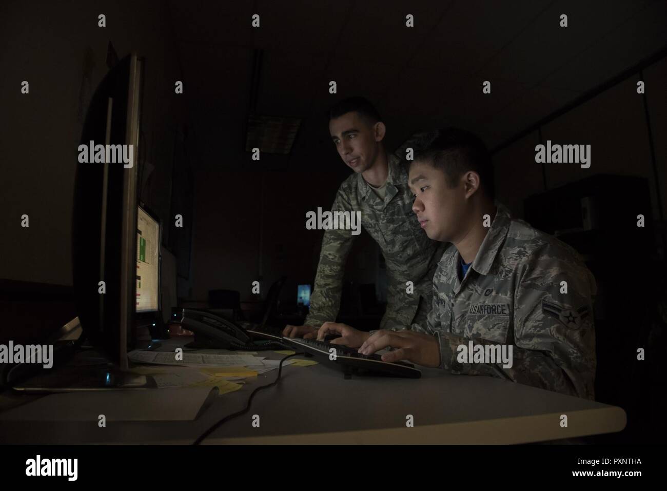 U.S. Air Force Senior Airman Joseph Goebel, left, and Airman 1st Class ...