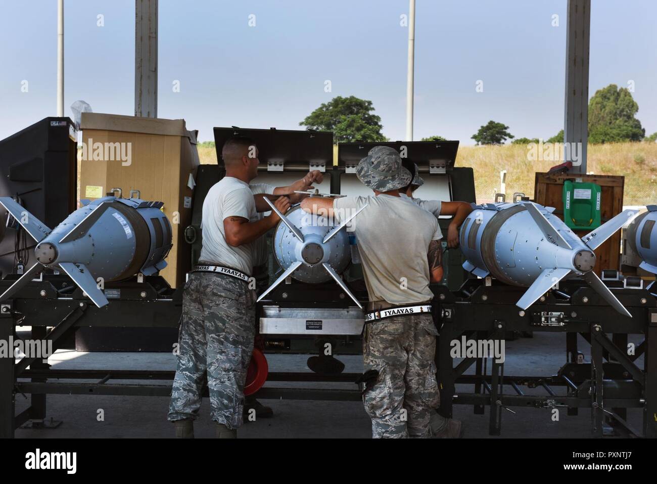 U.S. Airmen assigned to the 447th Expeditionary Aircraft Maintenance ...