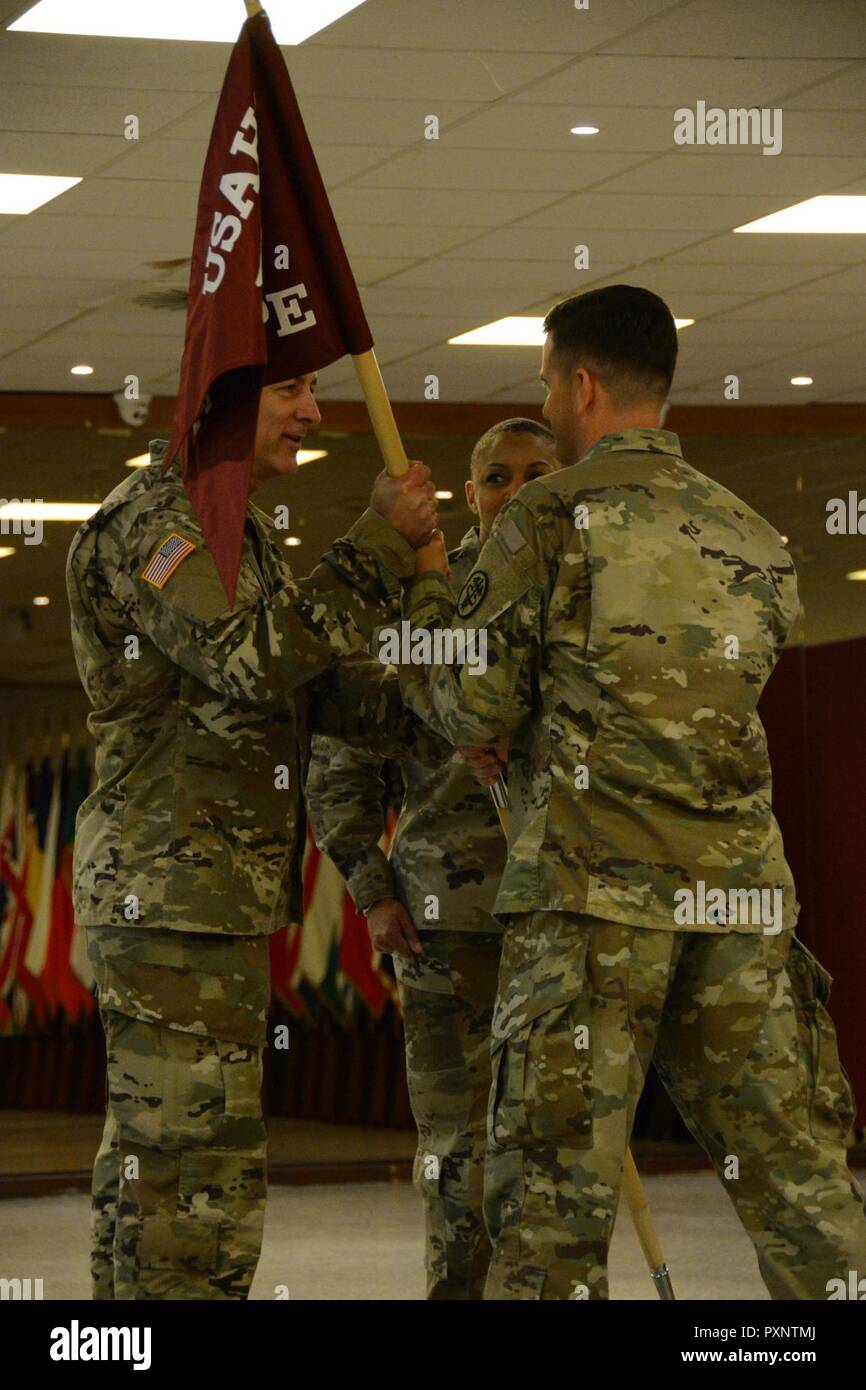 U.S. Army Col. Thomas R. Hustead (outgoing Commander), gives the Unit's ...