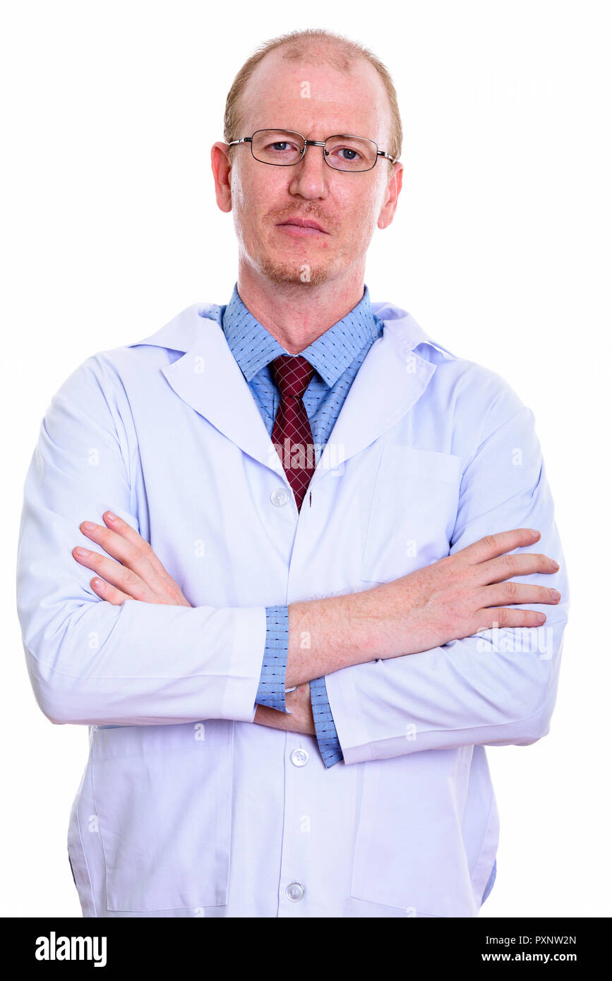 Studio shot of man doctor with arms crossed Stock Photo - Alamy