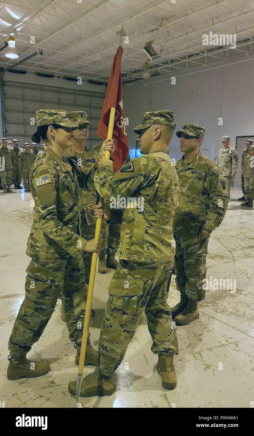 Texas Army National guardsmen Capt. Amanda Windle (left), the incoming ...