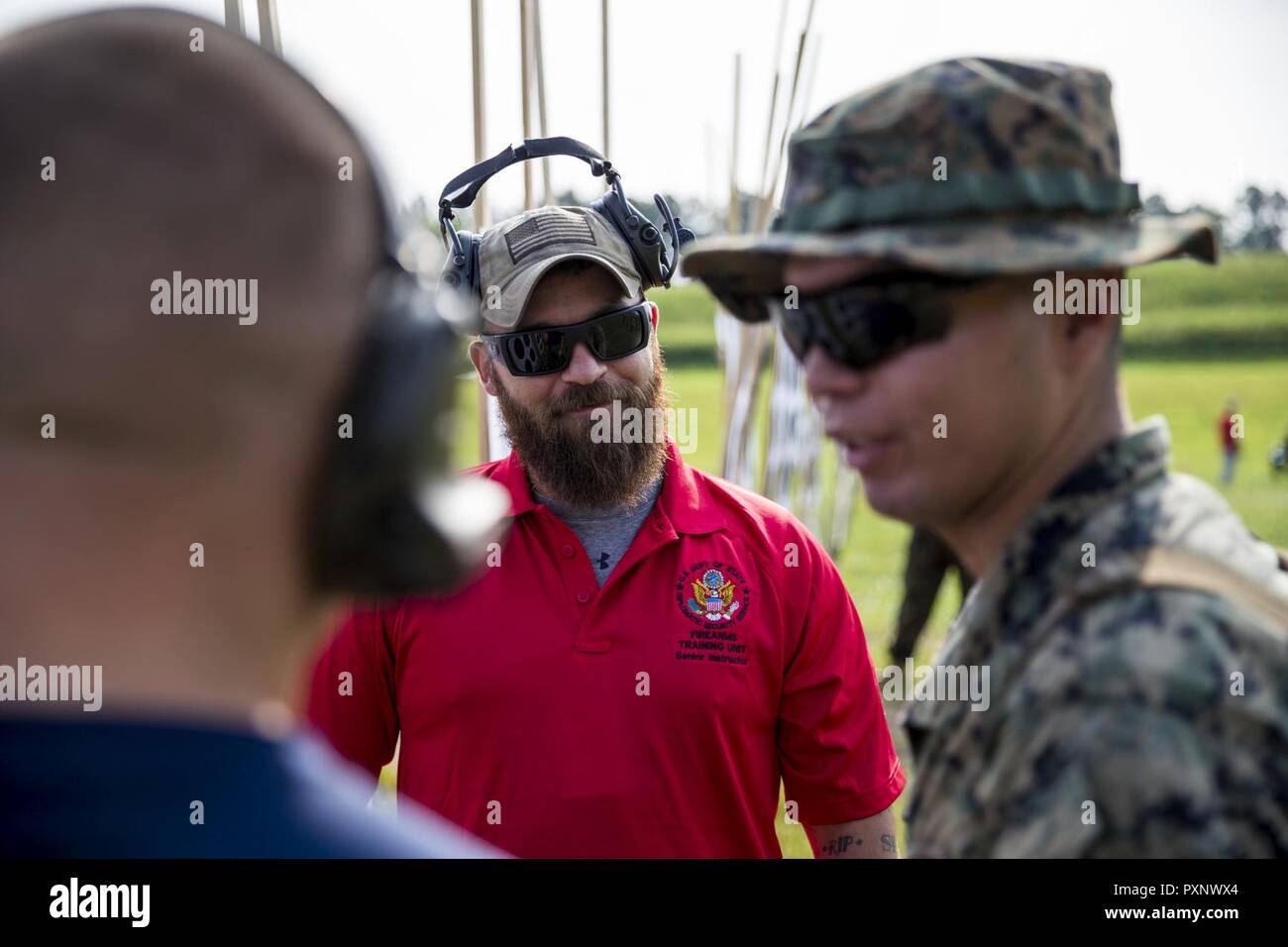 instructors with Marine Corps Embassy Security Group (MCESG) interact ...
