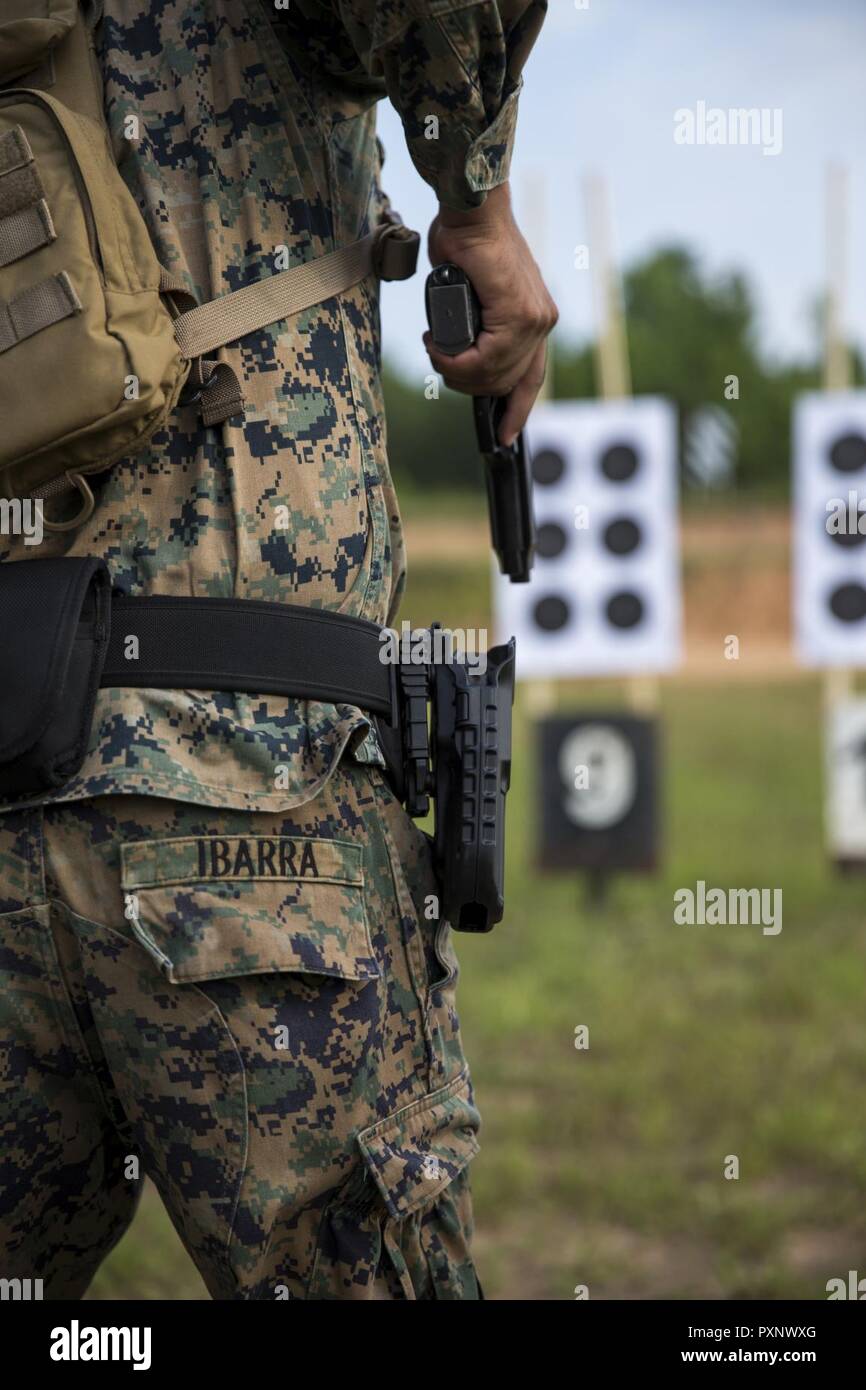 A U.S. Marine with Marine Corps Embassy Security Group (MCESG) prepares ...