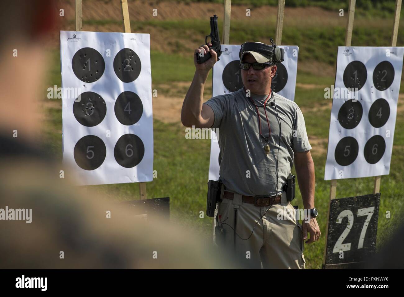 An instructor with Marine Corps Embassy Security Group (MCESG ...