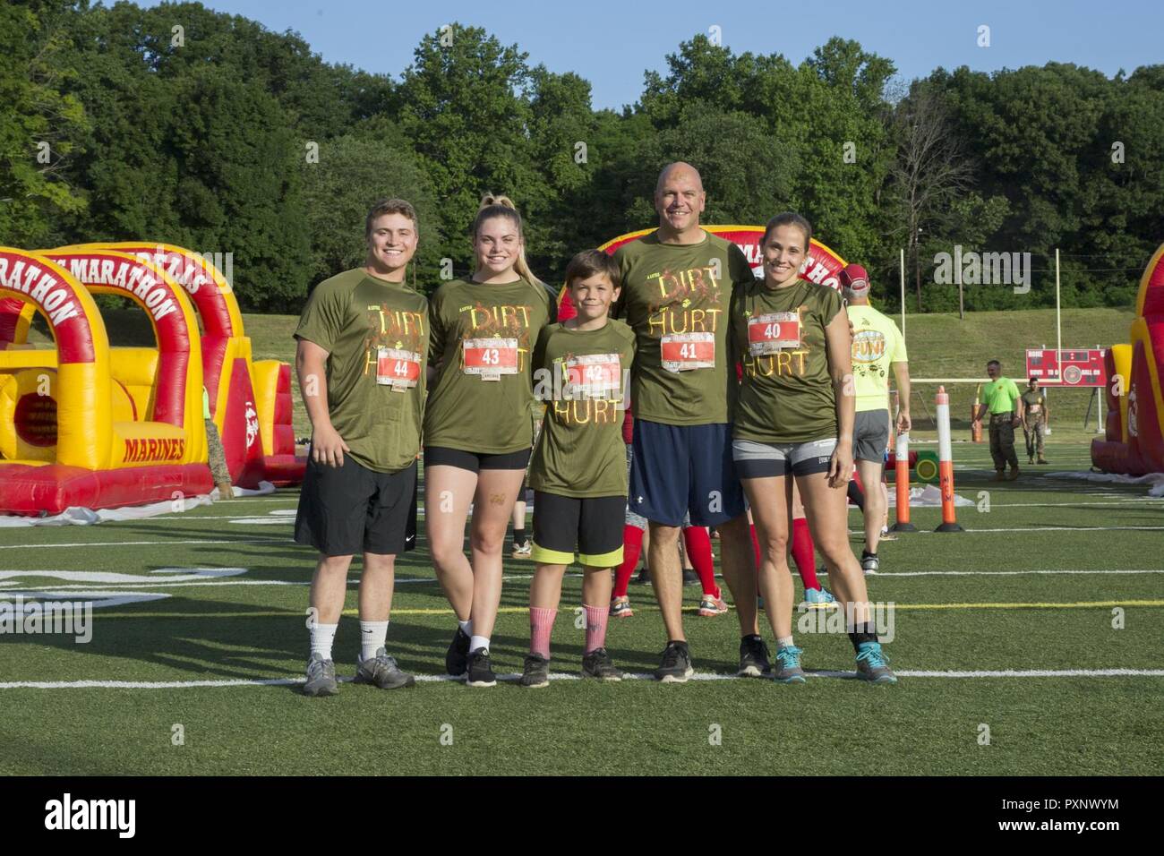 Participants pose for a photo during the annual Marine Corps Marathon ...