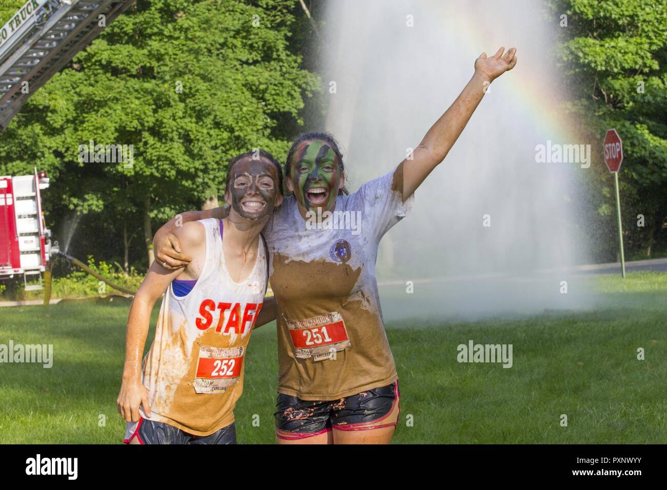 Participants pose for a photo during the annual Marine Corps Marathon ...