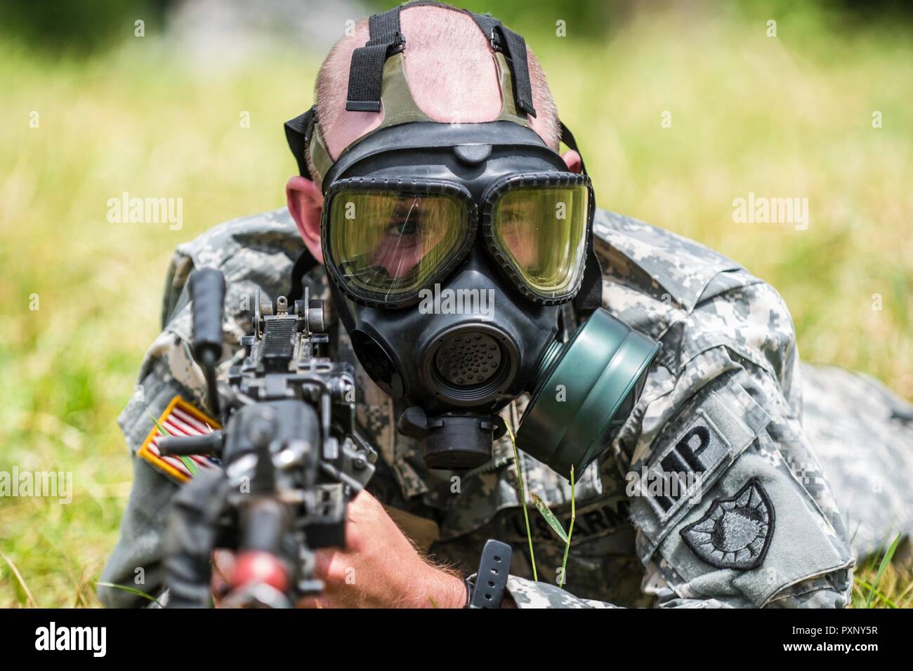 Soldier of the 488 Military Police Company conduct gas mask drills ...