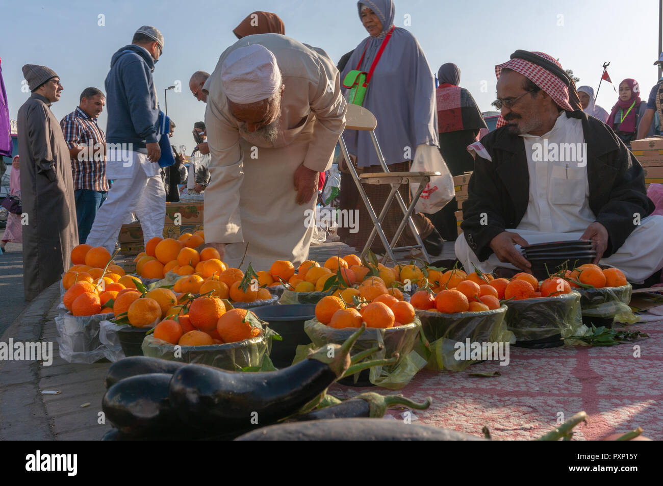 MEDINA, SAUDI ARABIA-CIRCA 2013: Unidentified man sells local produce ...