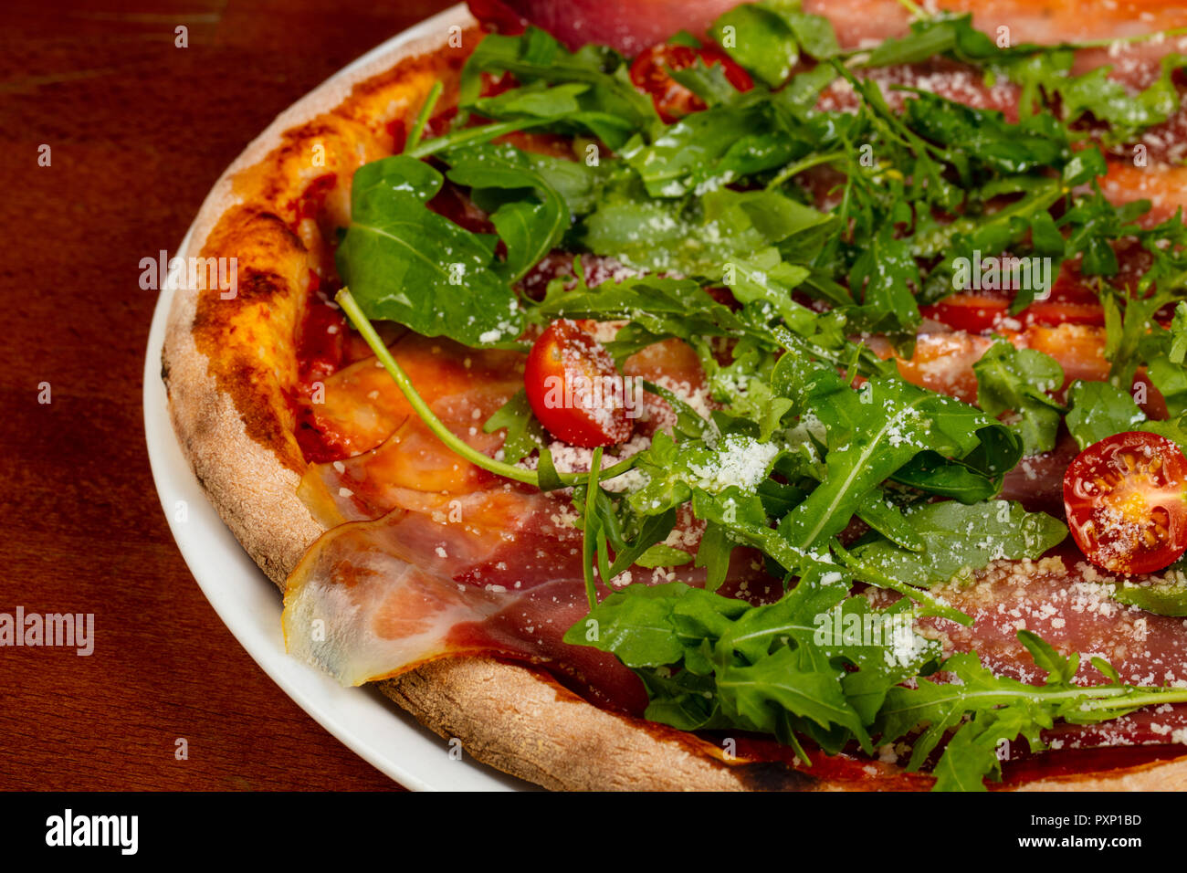 Pizza with ham and cheese Stock Photo - Alamy