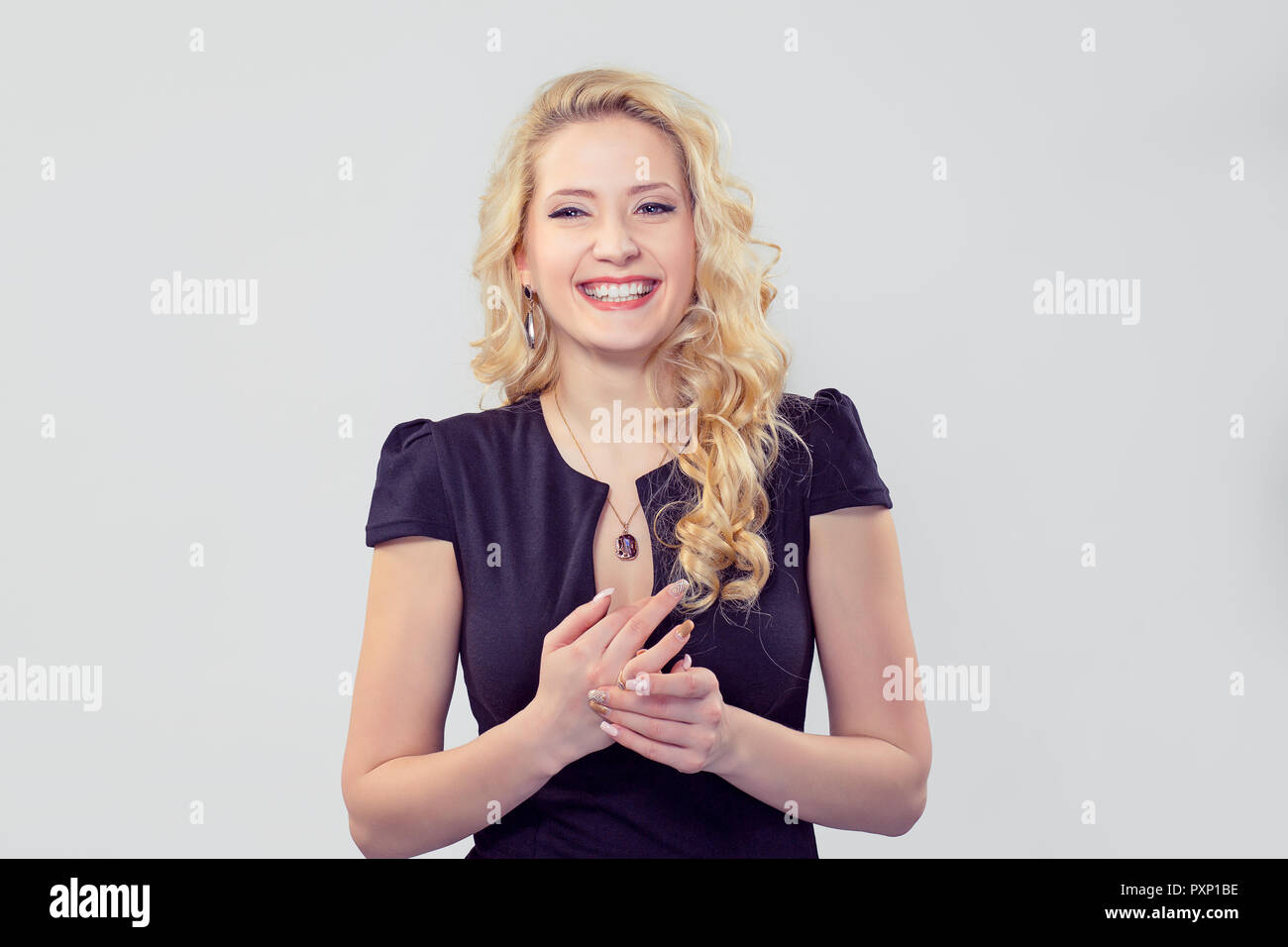 Super laughing charming blonde Stock Photo - Alamy