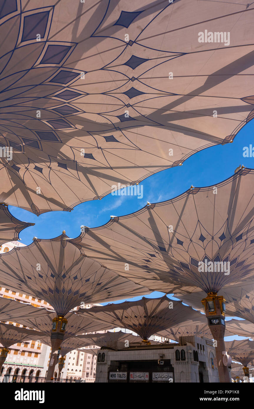 view of giant canopies at Masjid Nabawi (Mosque) compound in Medina ...