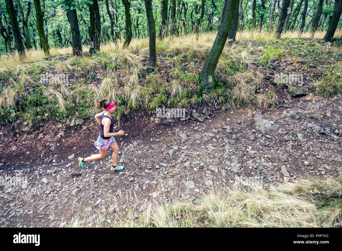 Trail running athletic woman in green forest, sports inspiration and ...