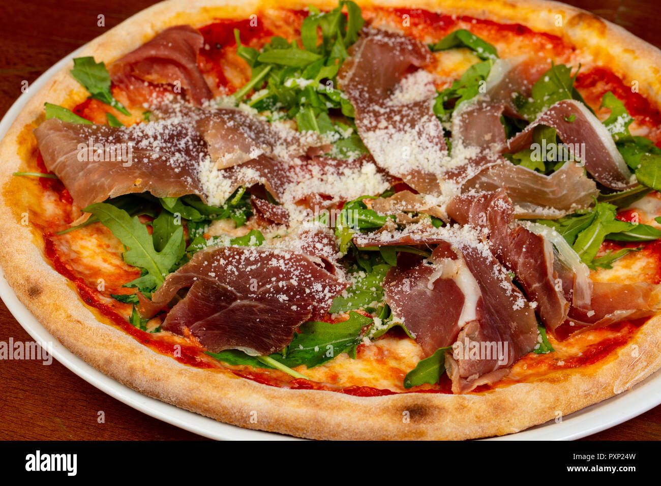 Pizza with ham and cheese Stock Photo - Alamy