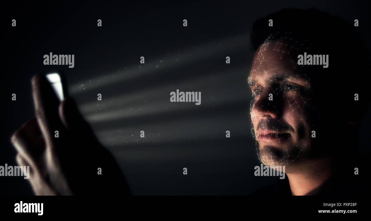 Unlocking latest smartphone with biometric facial identification Stock ... Unlocking latest smartphone with biometric facial identification Stock ...