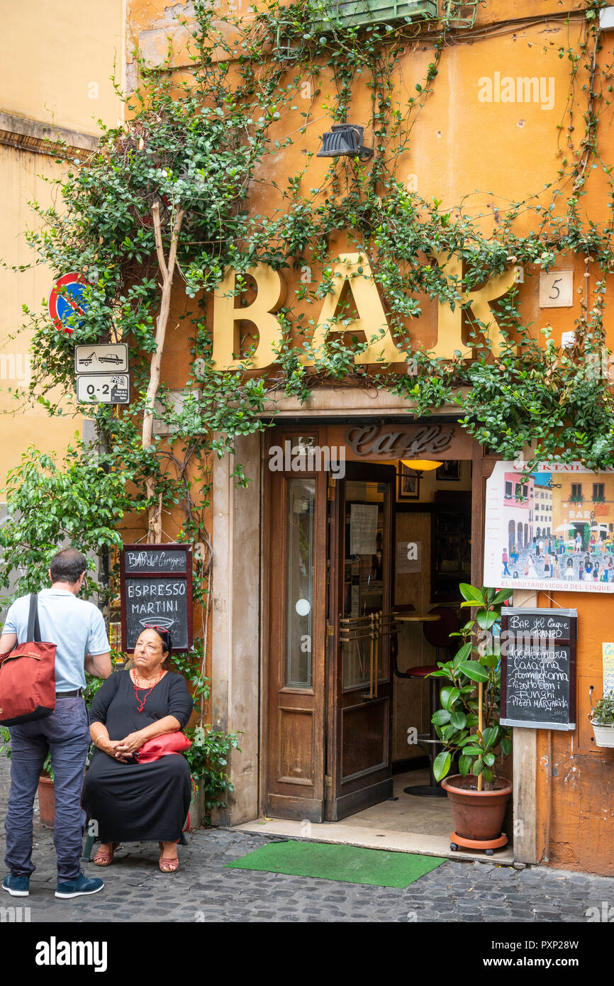 A colourful bar on the corner of Vicolo Del Cinque in the Trastevere ...