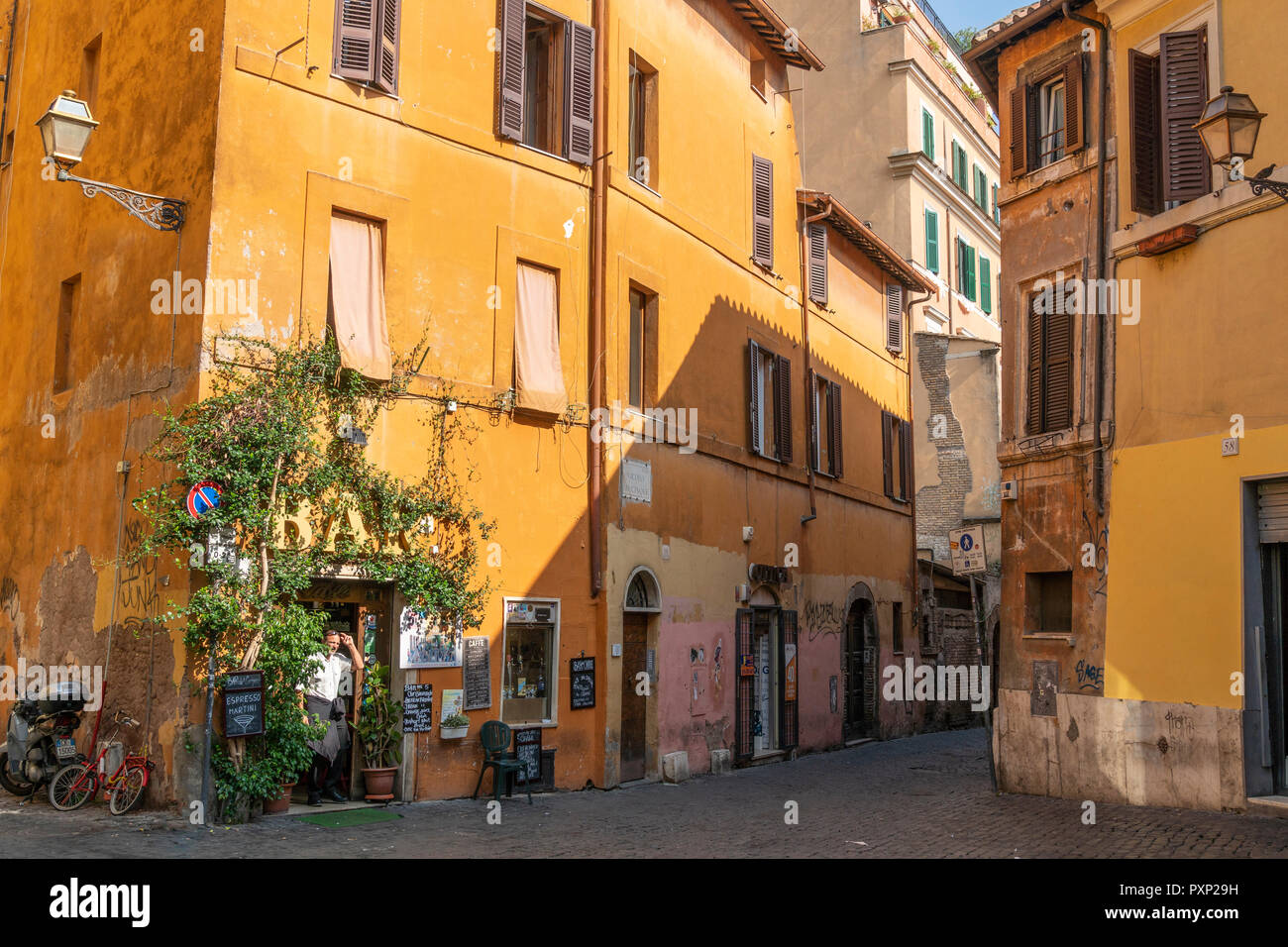 A colourful bar on the corner of Vicolo Del Cinque in the Trastevere ...