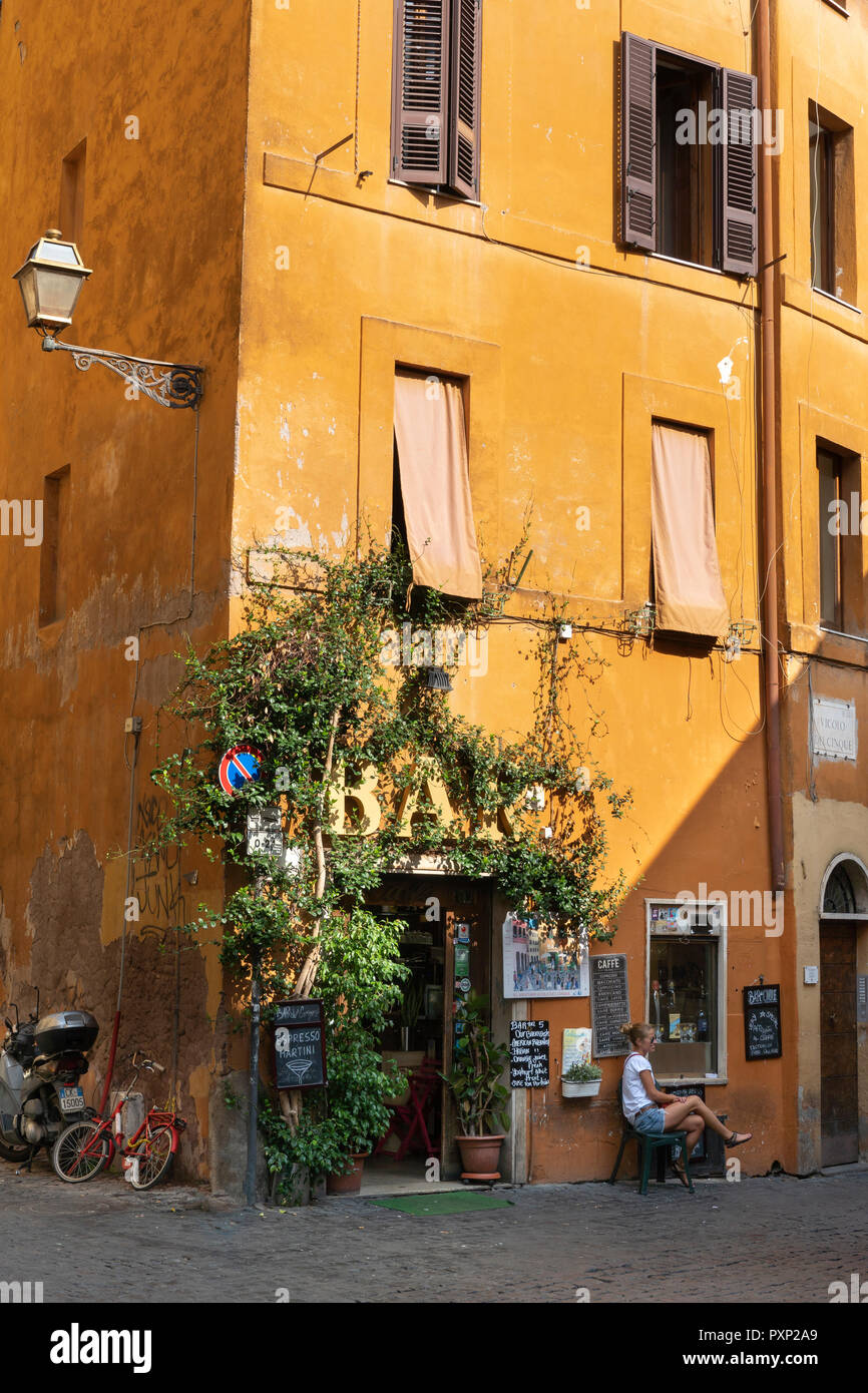 A colourful bar on the corner of Vicolo Del Cinque in the Trastevere ...