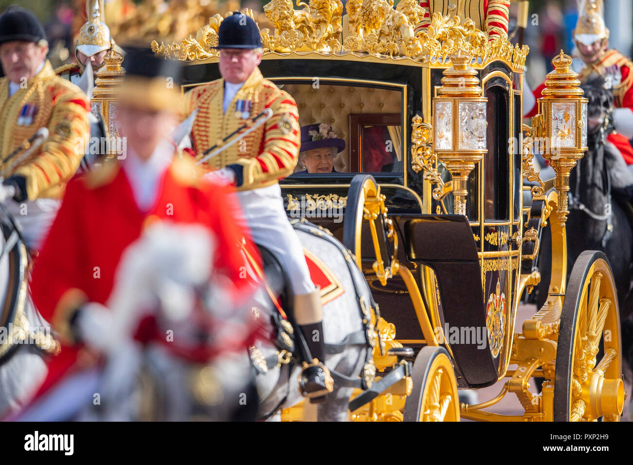 Queen Elizabeth II in the State Carriage as it arrives at Buckingham ...