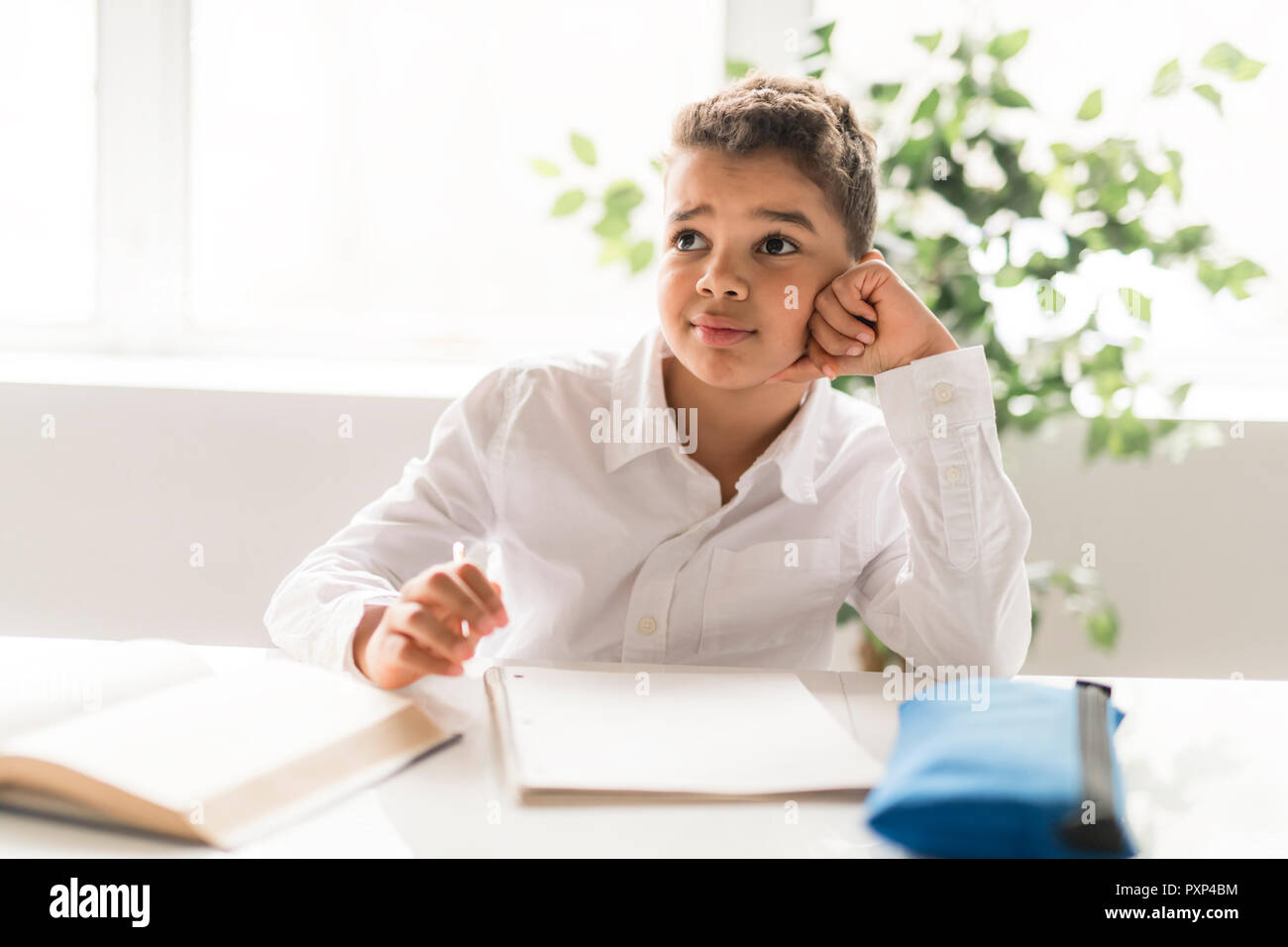 Black boy smiling doing hi-res stock photography and images - Alamy