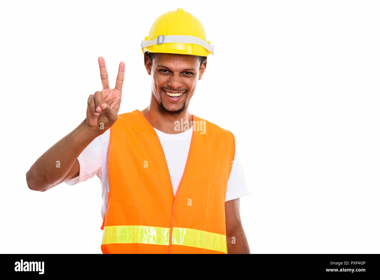 Young happy African man construction worker smiling while giving Stock ...