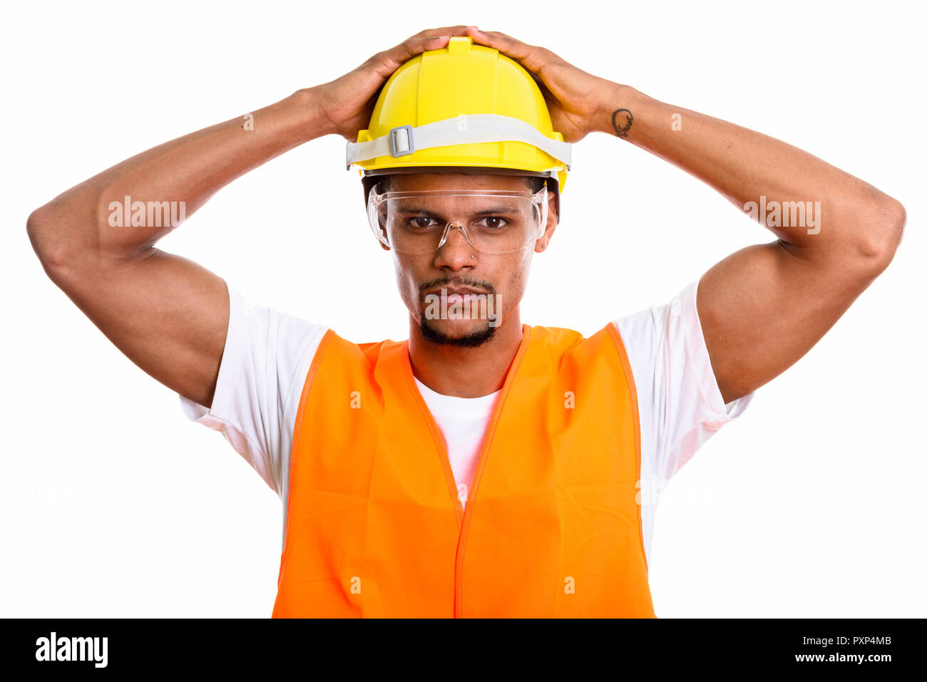 Young African man construction worker with both hands on safety Stock ... Young African man construction worker with both hands on safety Stock ...
