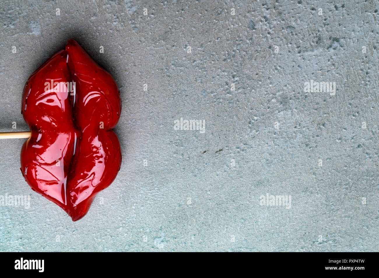 Bright red lips, candy kisses, St. Valentine's Day, close up, isolated ...