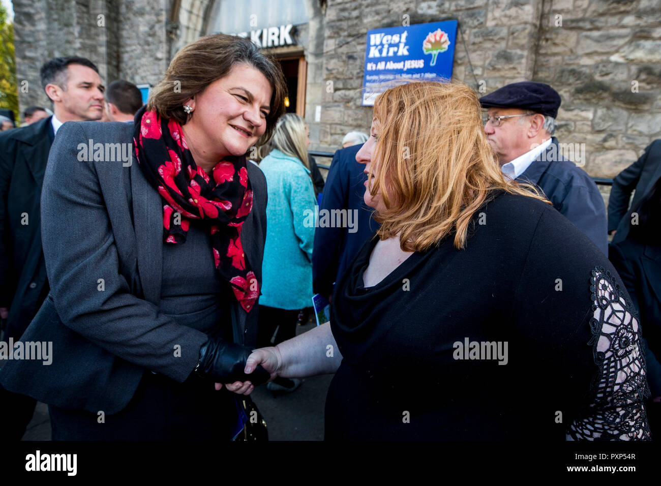 DUP leader Arlene Foster (left) shaking hands with Alliance Party ...