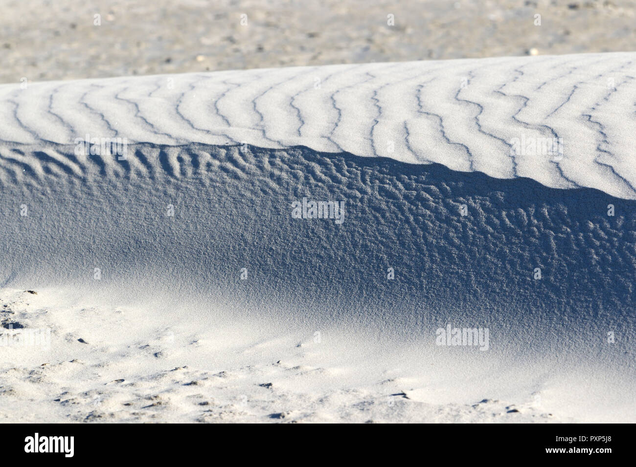 Beach in the middle of the day, shadows forming Stock Photo - Alamy