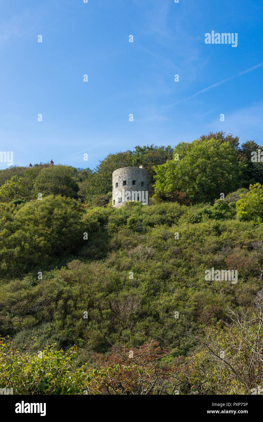 Old Guernsey loophole towers Stock Photo - Alamy
