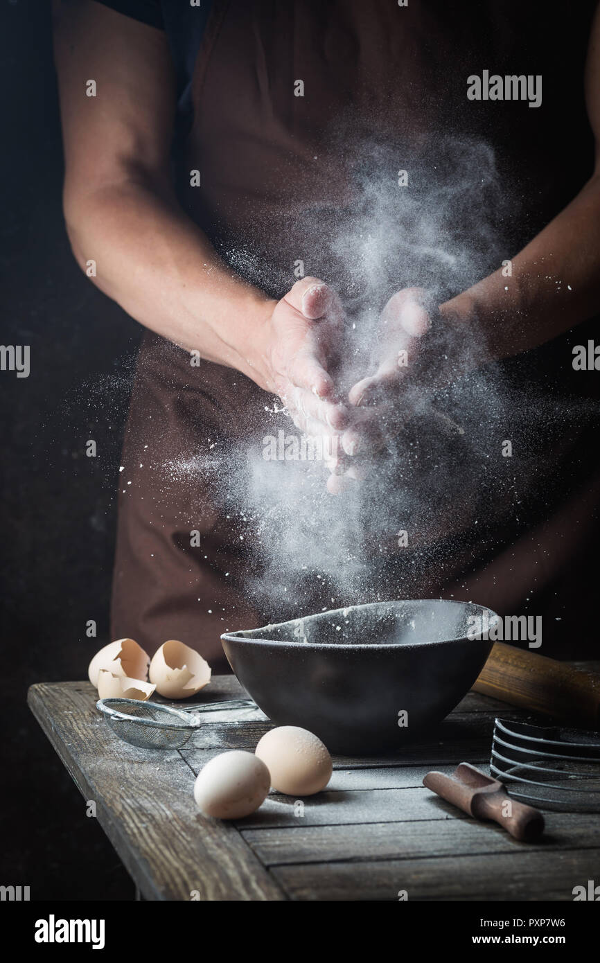 Hand clap of professional chef with bowl for cooking and baking ...