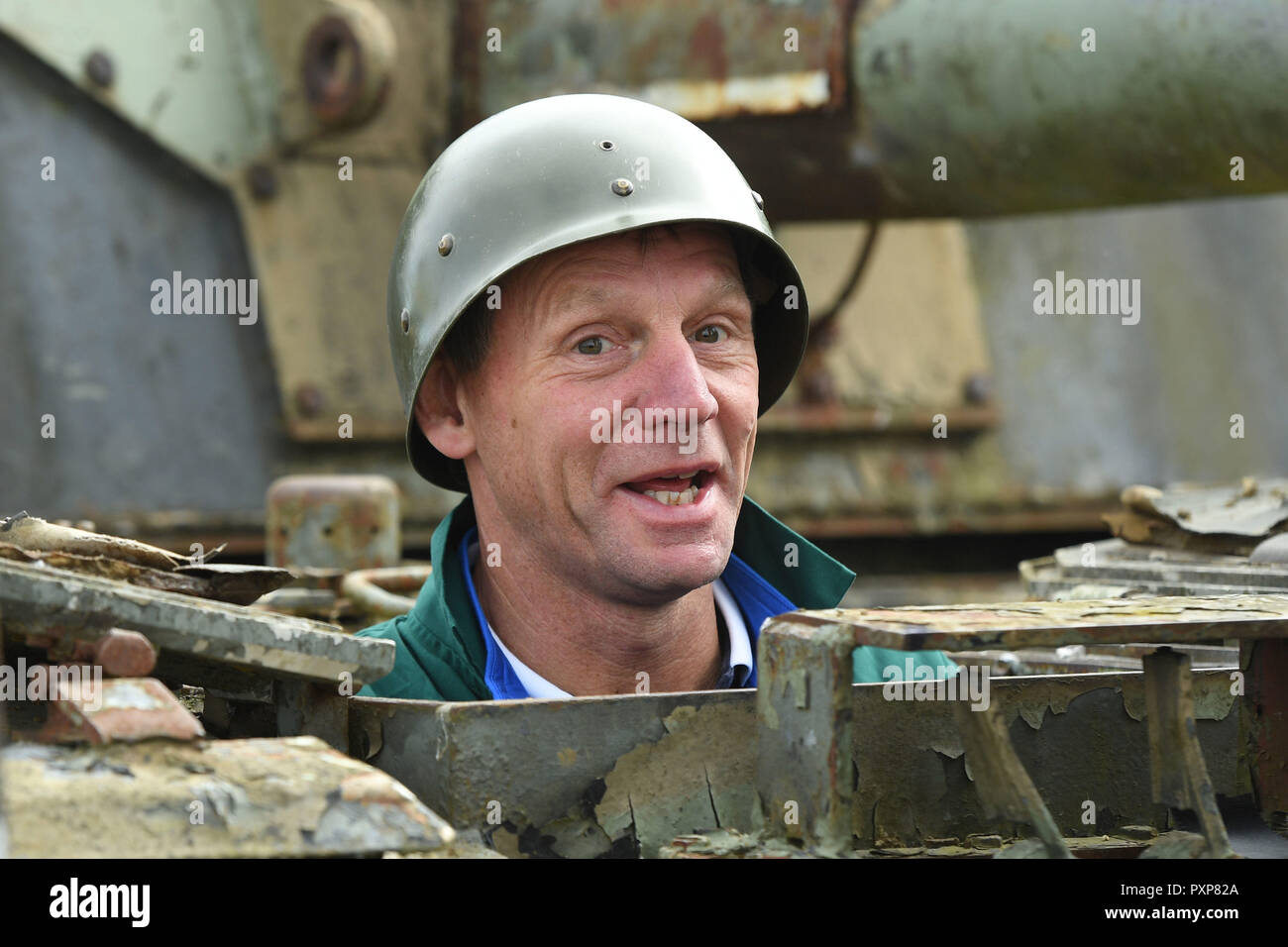 Former football Stuart Pearce tries his hand at driving a tank at the ...
