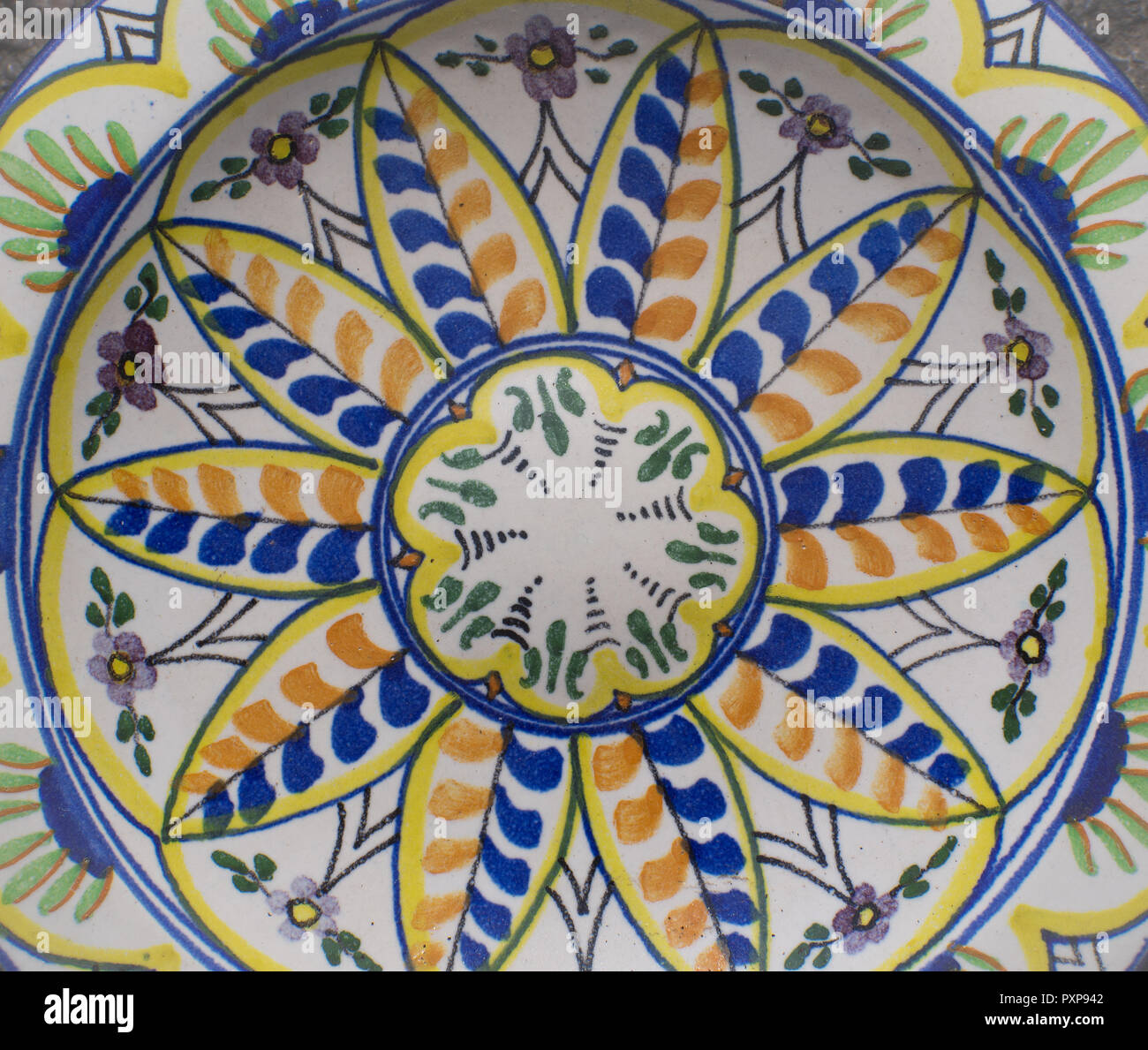 Detail of the traditional tiles from facade of old house. Decorative ...