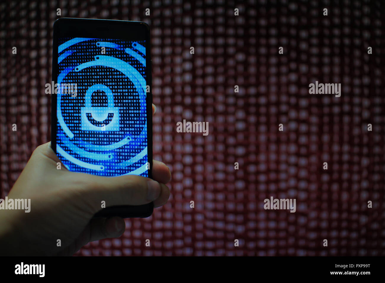 system integrity working while other pass down. hand holding mobile ...