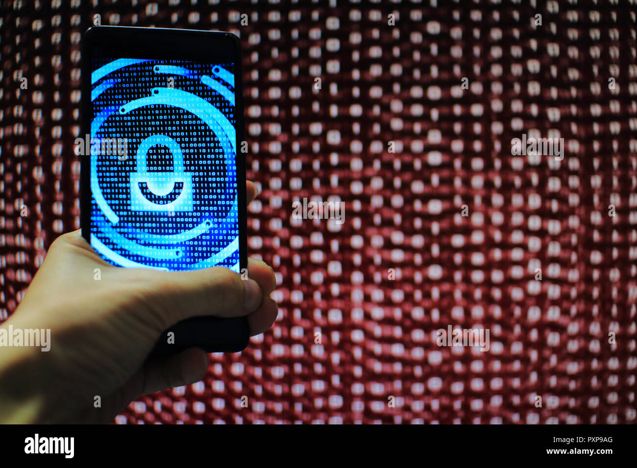 system integrity working while other pass down. hand holding mobile ...