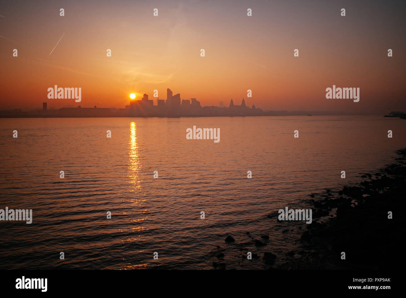The sun rises over the city of Liverpool Stock Photo - Alamy