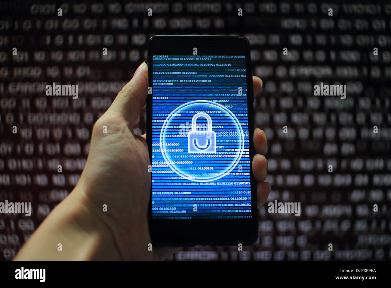 system integrity working while other pass down. hand holding mobile ...