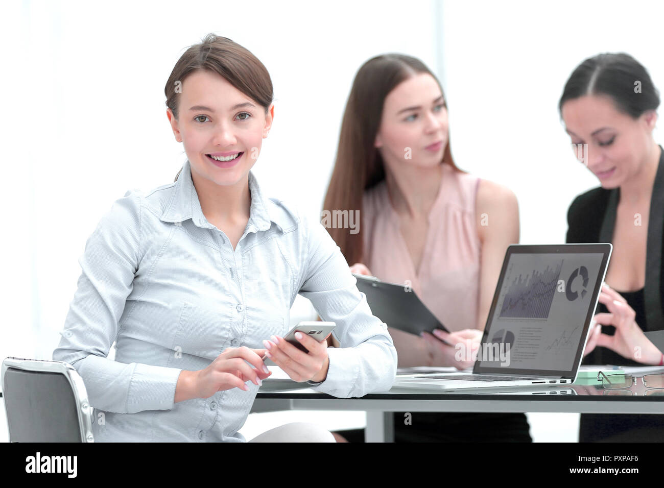 portrait of modern business woman at her Desk Stock Photo - Alamy