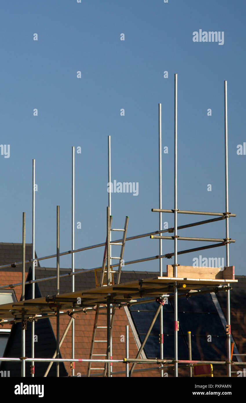 scaffolding on UK building site Stock Photo - Alamy
