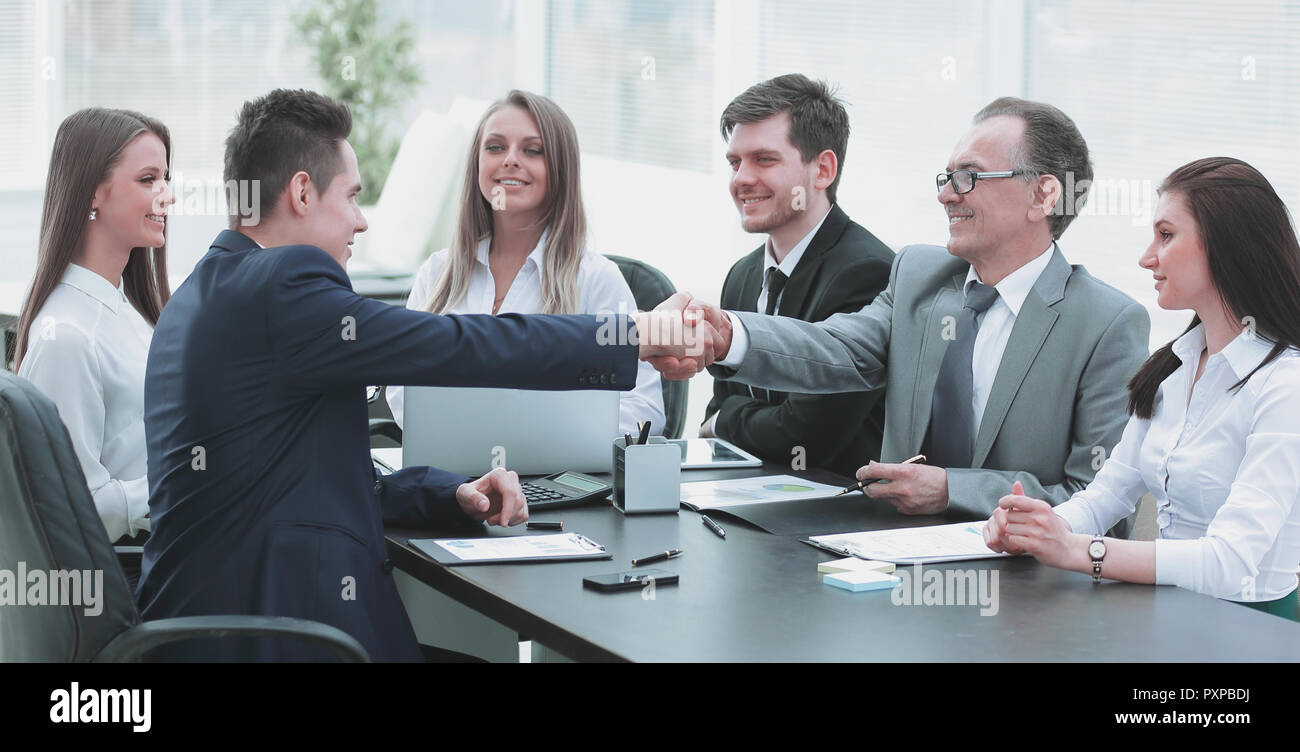 business partners shaking hands after a successful transaction Stock ...
