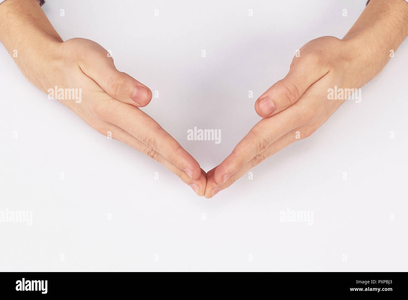 Male hands in the form of angle. Isolated on a white background Stock ...