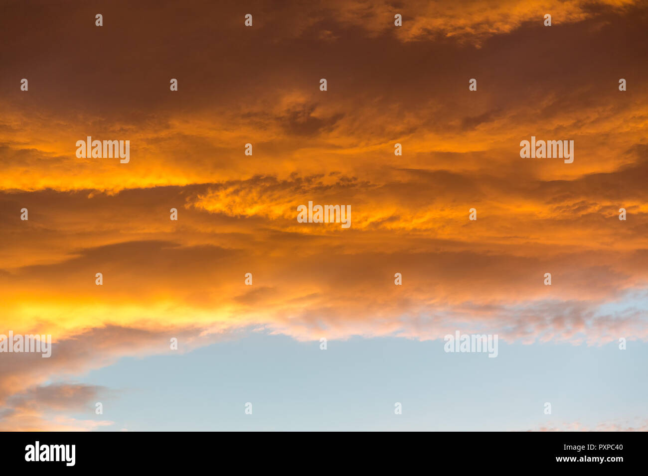 Vibrant orange and yellow sunset sky Stock Photo - Alamy