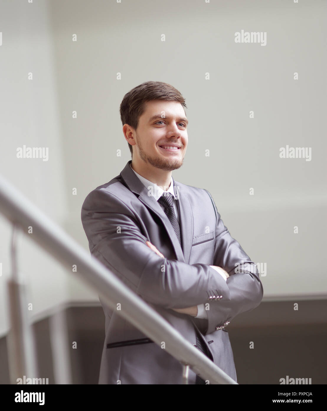 rear view.thoughtful businessman looking out the office window Stock ...