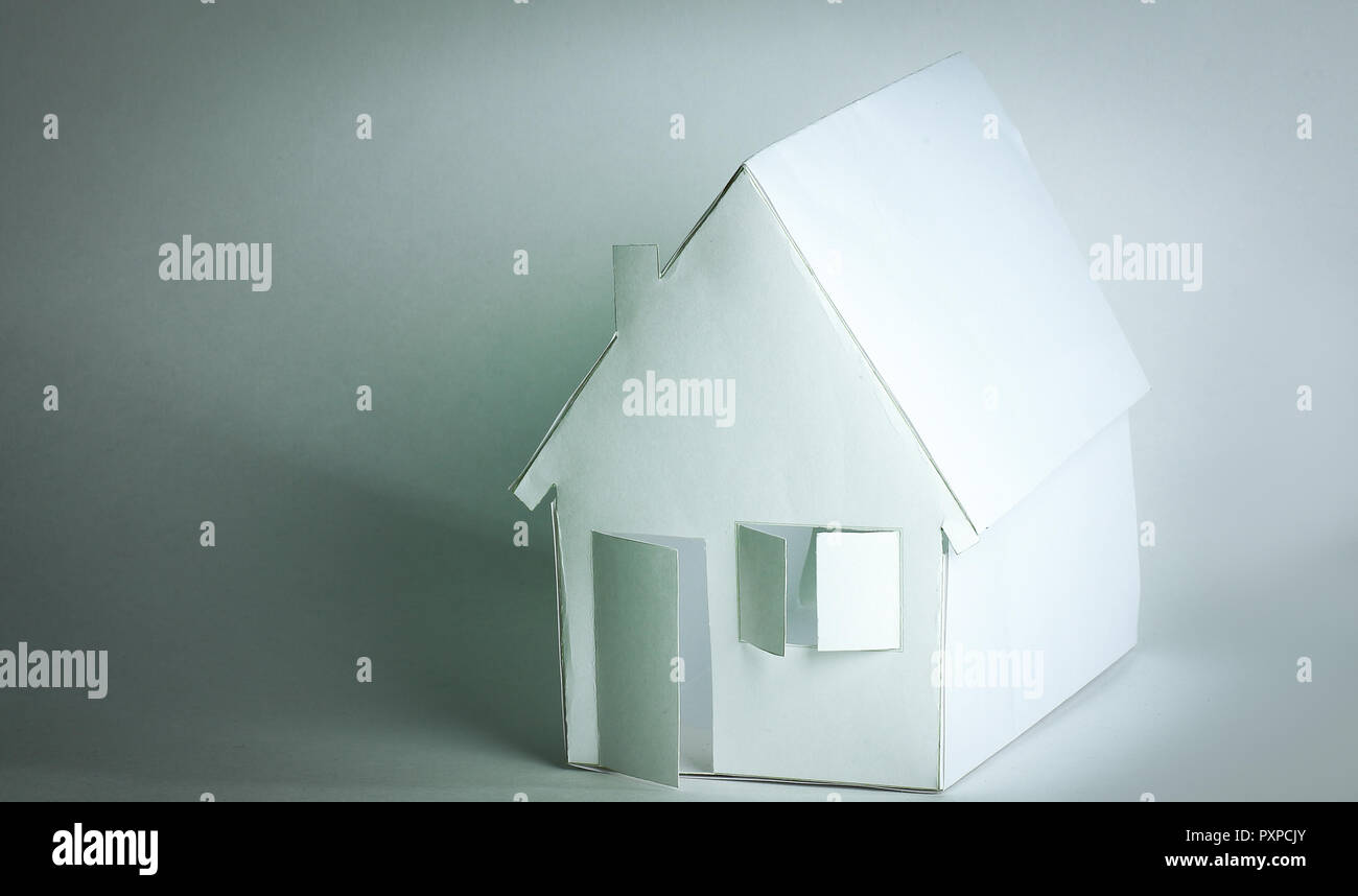 paper house paper background.the concept of a mortgage Stock Photo - Alamy