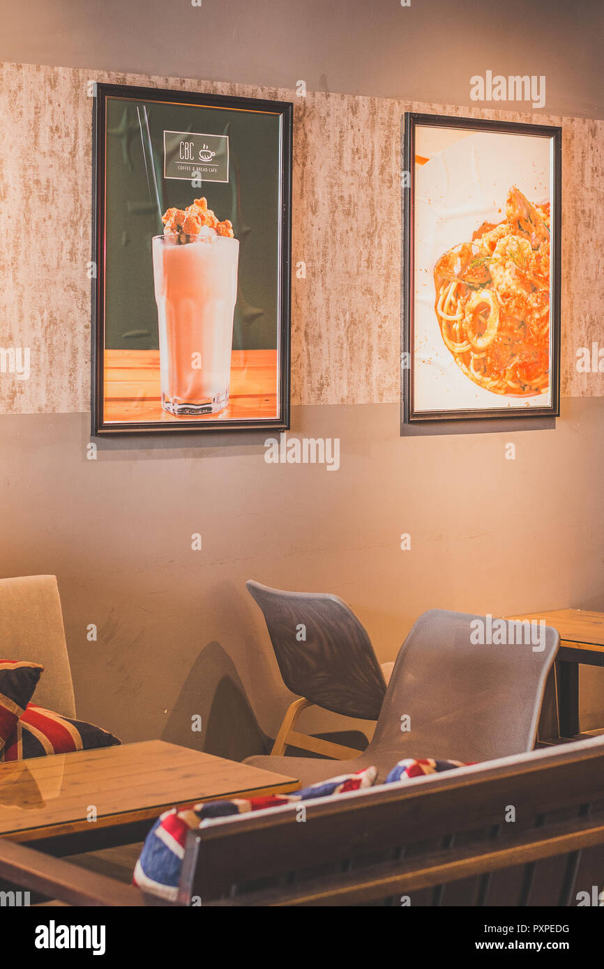 beautiful cosy cafe environment with tables and seating Stock Photo - Alamy