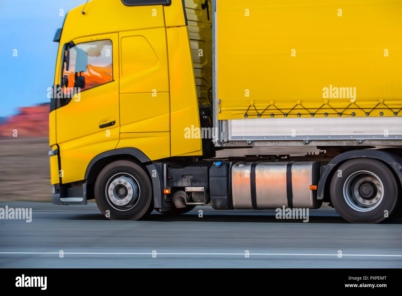 big truck goes on highway close up Stock Photo - Alamy