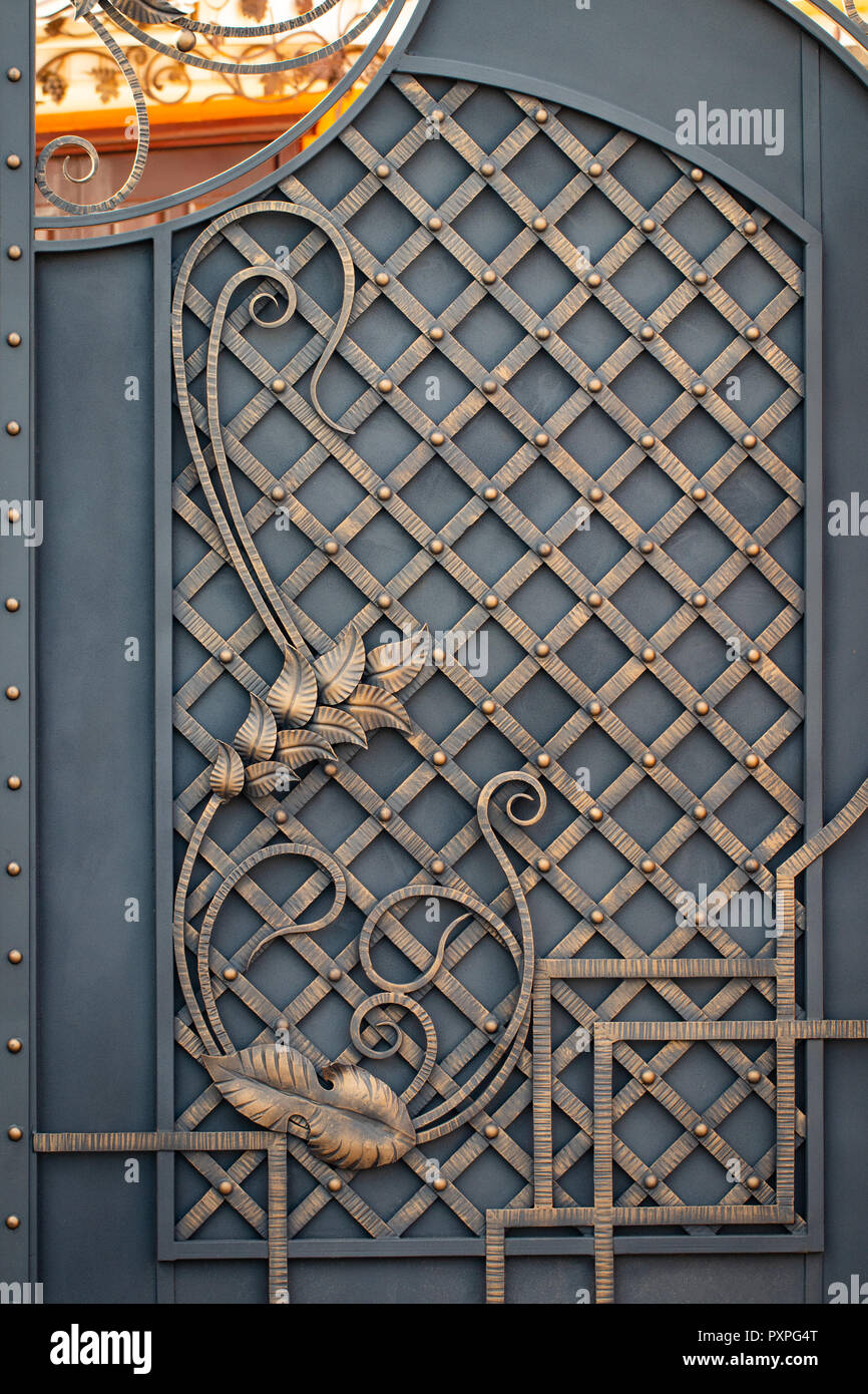 wrought-iron gates, ornamental forging, forged elements close-up Stock ...