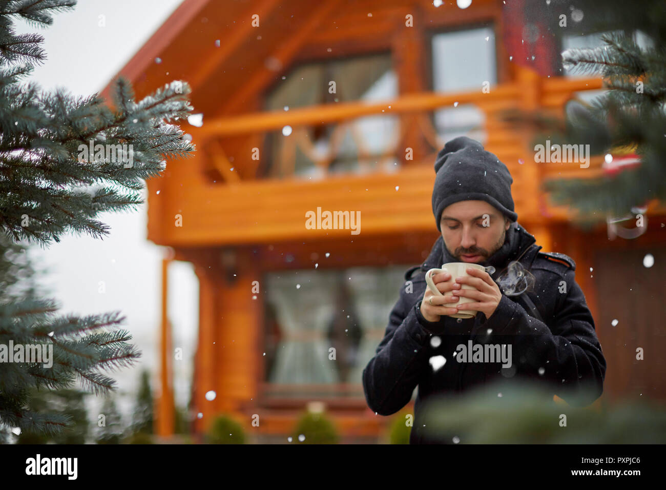 Man enjoying snowfall hi-res stock photography and images - Alamy