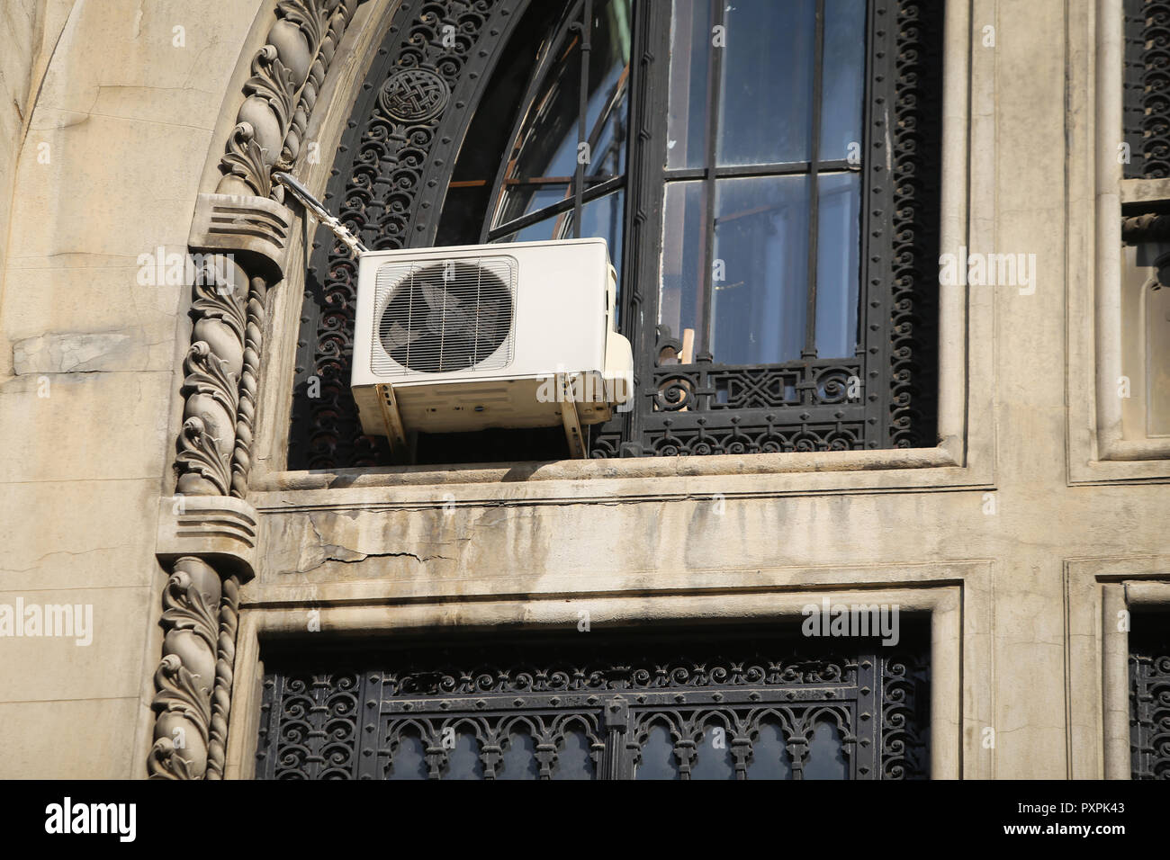 Air conditioner machine on the facade of an old (interbelic period ...