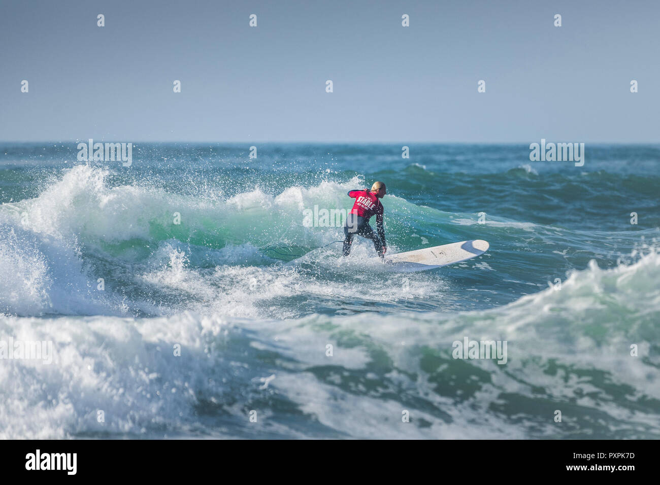 Surfing UK - A surfer competing in a longboard surfing competition at ...