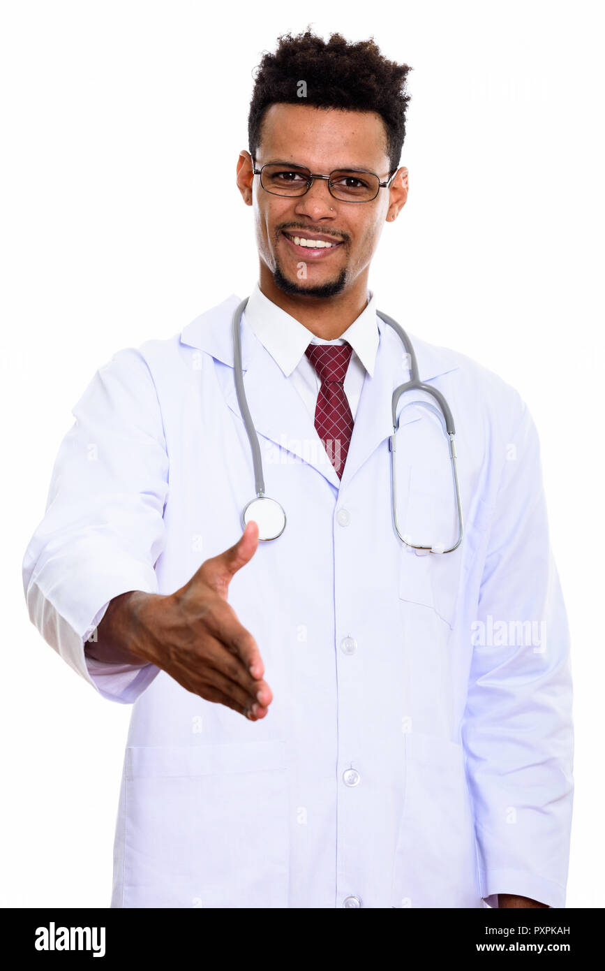 Young happy African man doctor smiling and giving handshake Stock Photo ...
